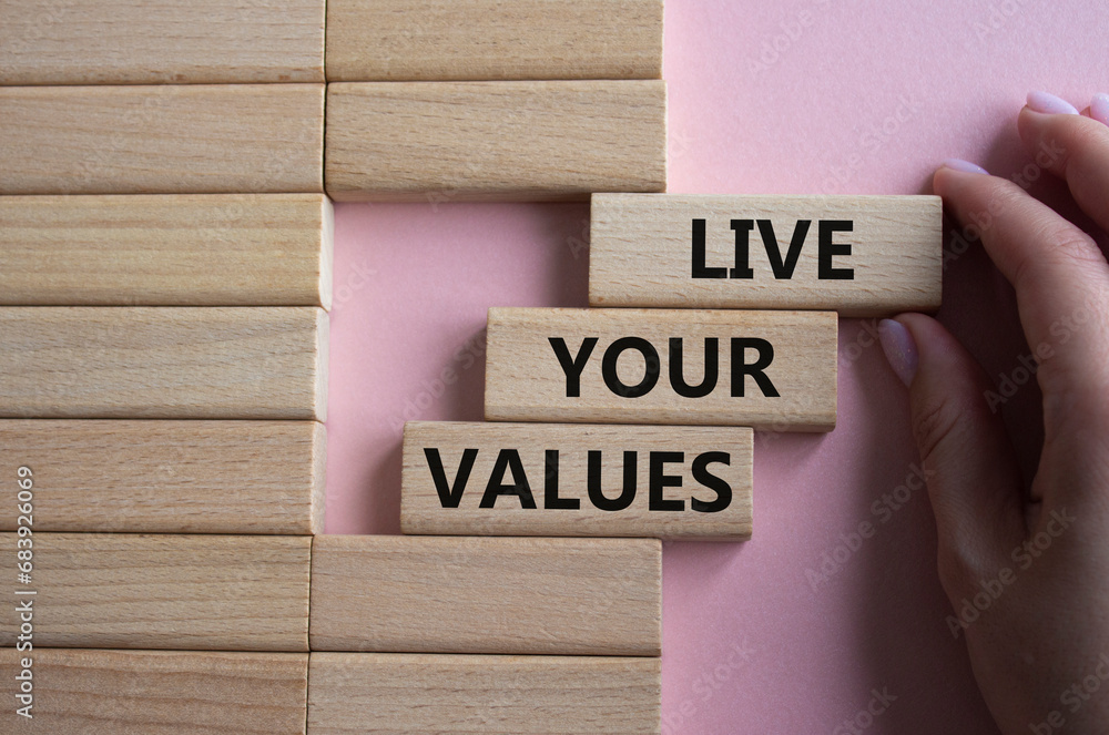 Live your values symbol. Concept words 'Live your values' on wooden ...