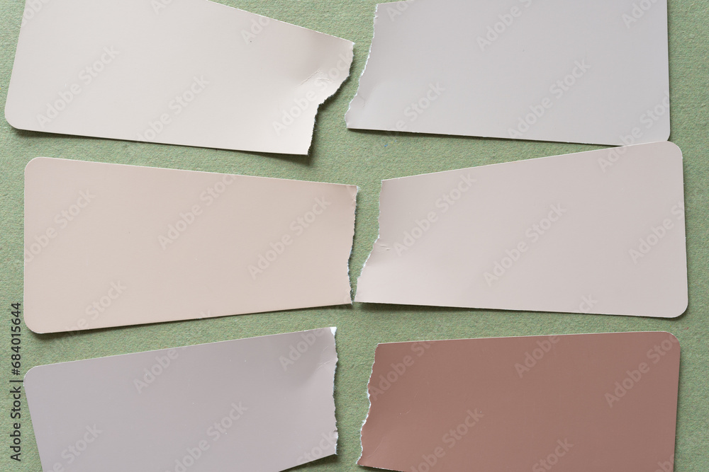 six pieces of paint-chip sample cards with analogous color scheme on ...