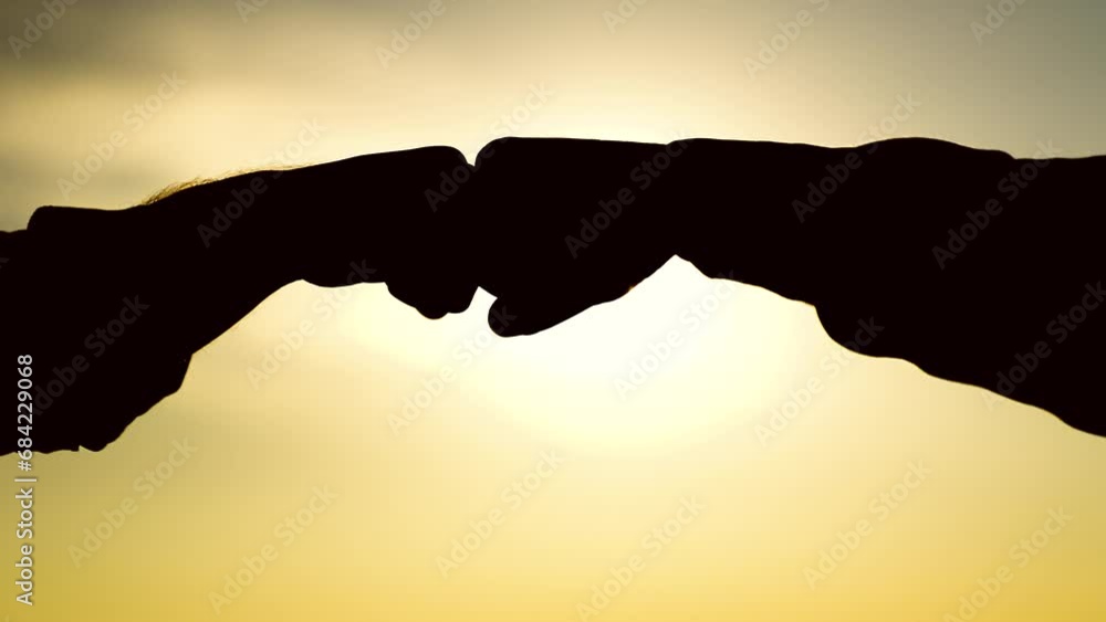 happy family. fists sunset close-up. handshake two people. work ...