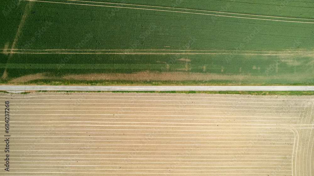 This image displays an aerial view of agricultural land, showcasing the ...