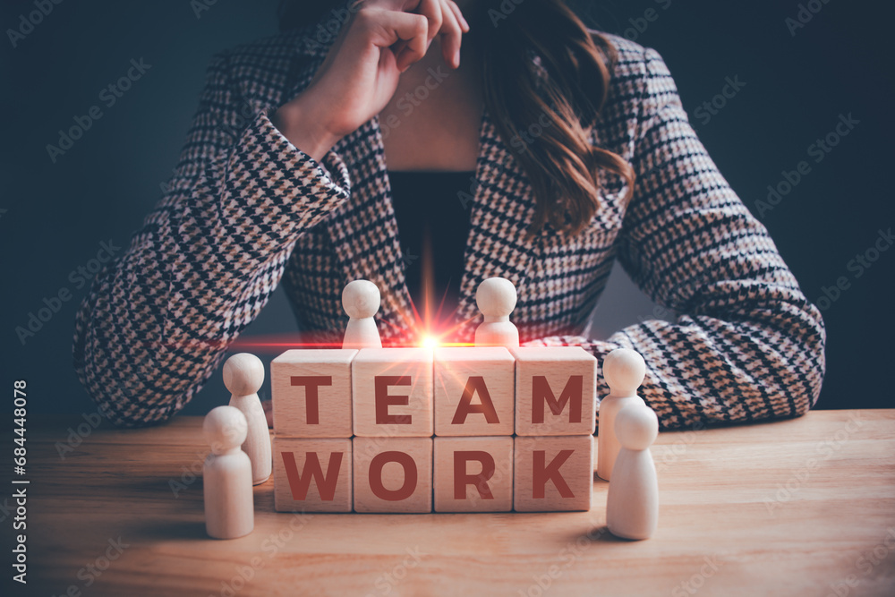 "TEAMWORK" text on wooden cube blocks and people symbol. Human resource ...