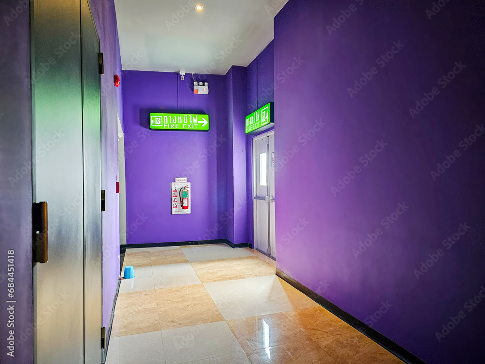 Foto de Public fire exit entrance. Fire exit sign and walkway and fire ...