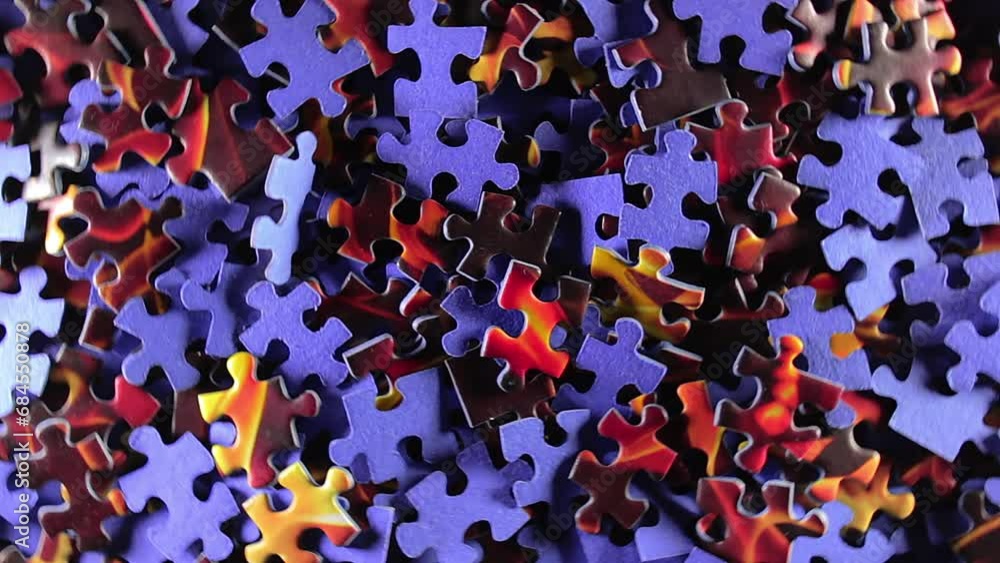 Background of Colored Puzzle Pieces that Rotating Counterclockwise ...