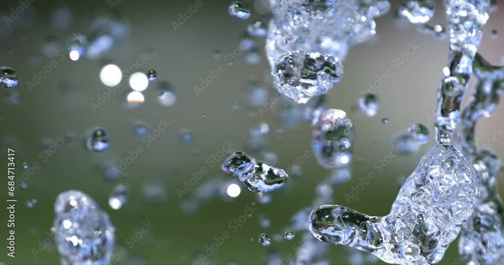 Slow motion macro of floating micro particles molecules in liquid are ...