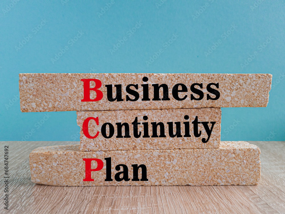 Business Continuity Plan symbol. On a bright blue background brick ...