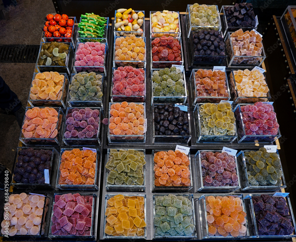 Brightly colored display of marzipan and gelatin candy in Barcelona ...
