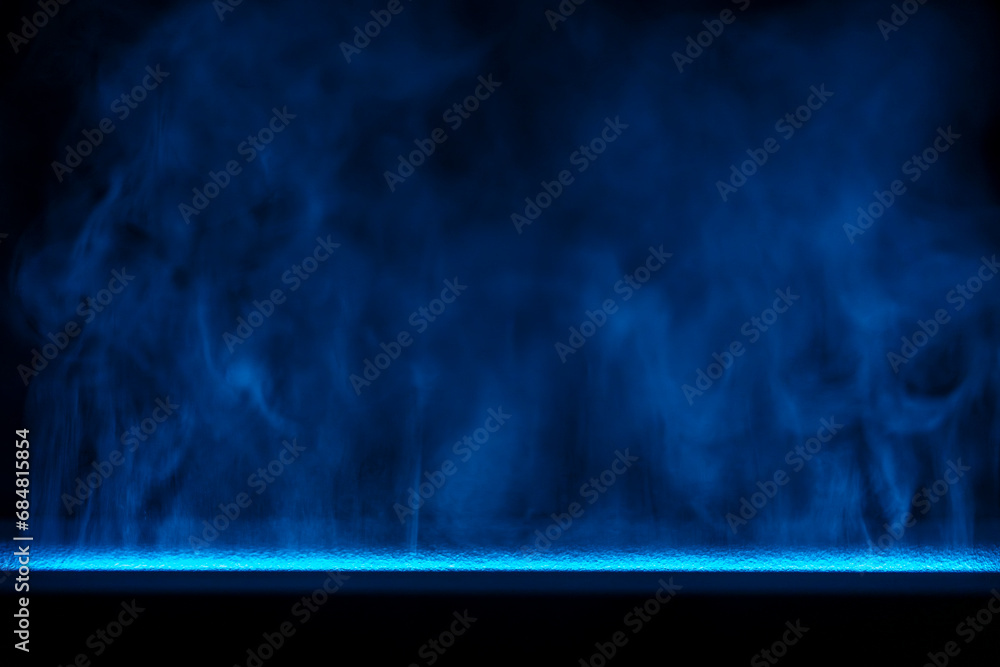 Water blue vapor from the humidifier on a black background, closeup ...