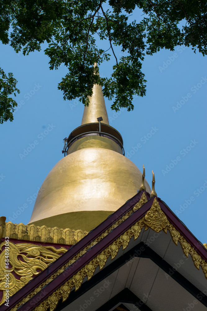 Golden pagoda in temple. Klenteng Sanggar Agung Kenjeran is a Chinese ... Golden pagoda in temple. Klenteng Sanggar Agung Kenjeran is a Chinese ...