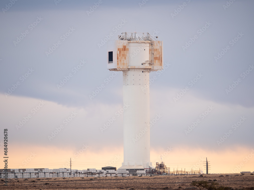 Khi Solar One concentrated solar tower with moody sunrise clouds Stock ...