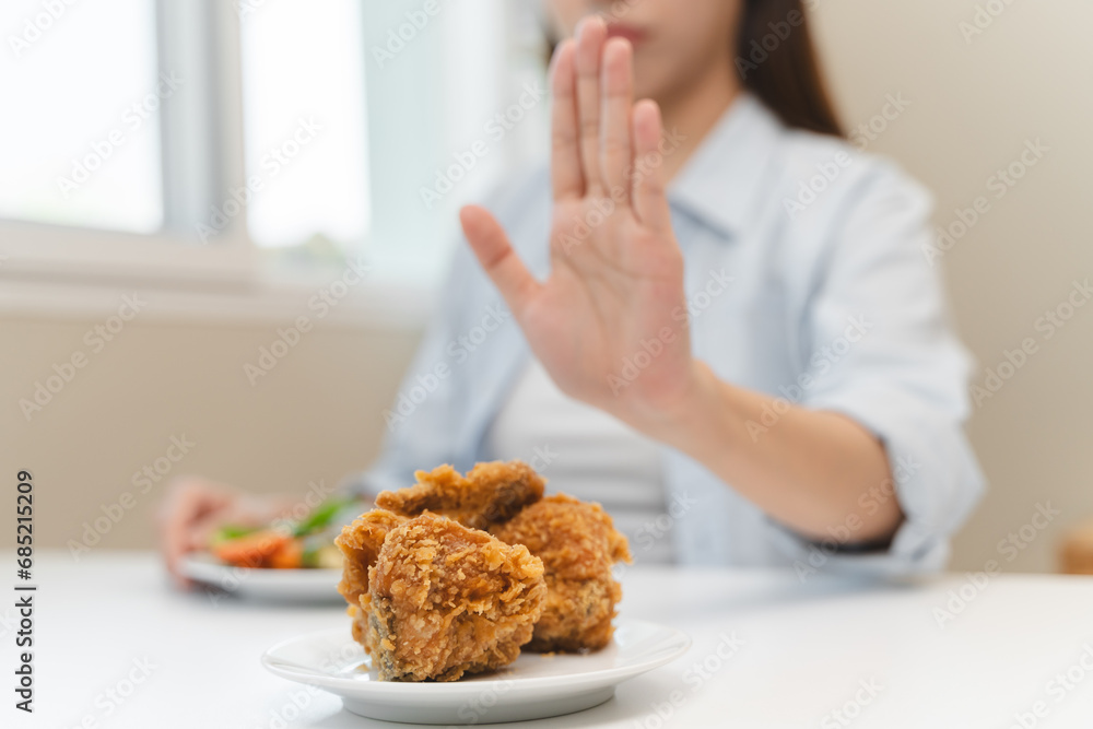 Diet food loss weight concept, Hand of woman pushing fast food away and ...