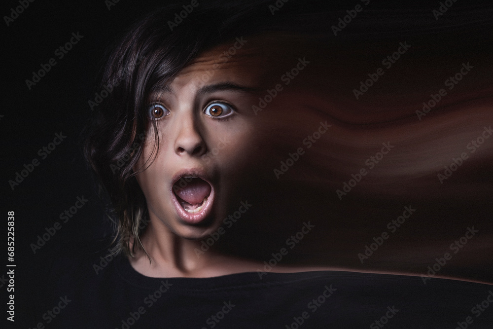 Portrait of a scared teenage girl losing her identity with her face ...