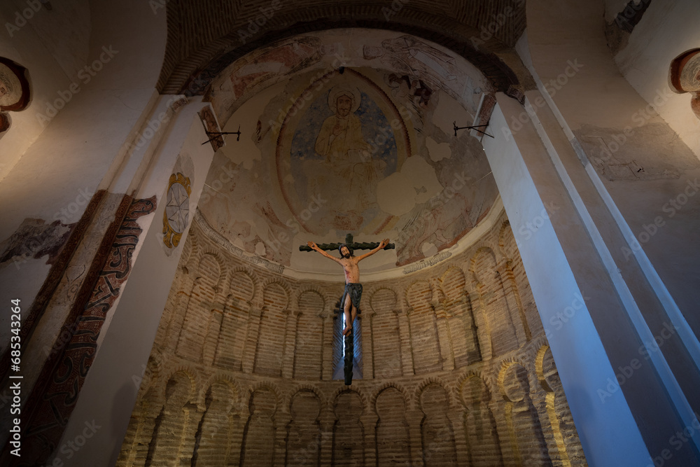 Figure of crucified Jesus Christ hanging in the apse of the Mudejar ...