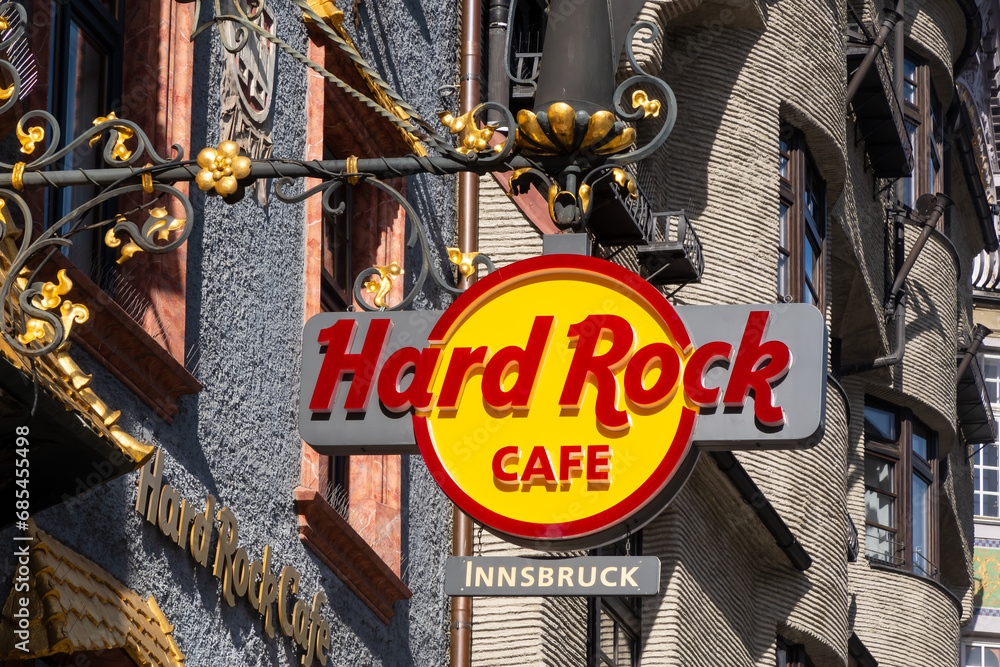 Hard Rock Cafe sign in Innsbruck historic city, is a chain of theme bar-restaurants founded in ...