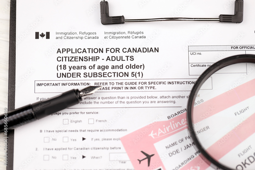 Application for Canadian citizenship for adults on A4 tablet lies on ...