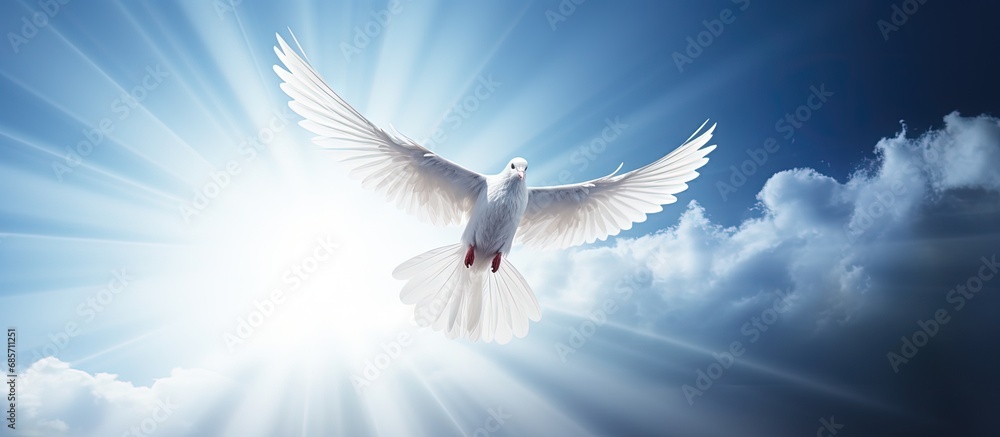 Christian symbol of bright light shining from heaven is the holy spirit ...