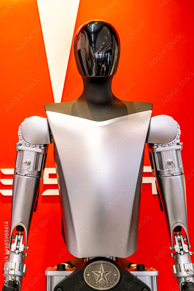 A new Tesla Optimus bot robot on display at the Tesla showroom at ...