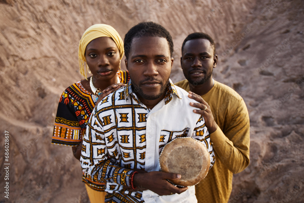 High angle view at group of Black people wearing traditional outfits ...