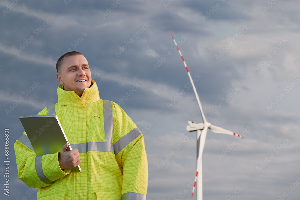 Happy offshore worker and engineer performs a sustainable energy job on ...