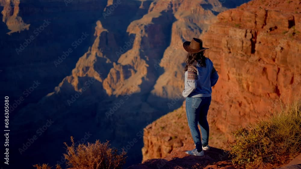 Native American girl is fascinated by the breathtaking beauty of the ...