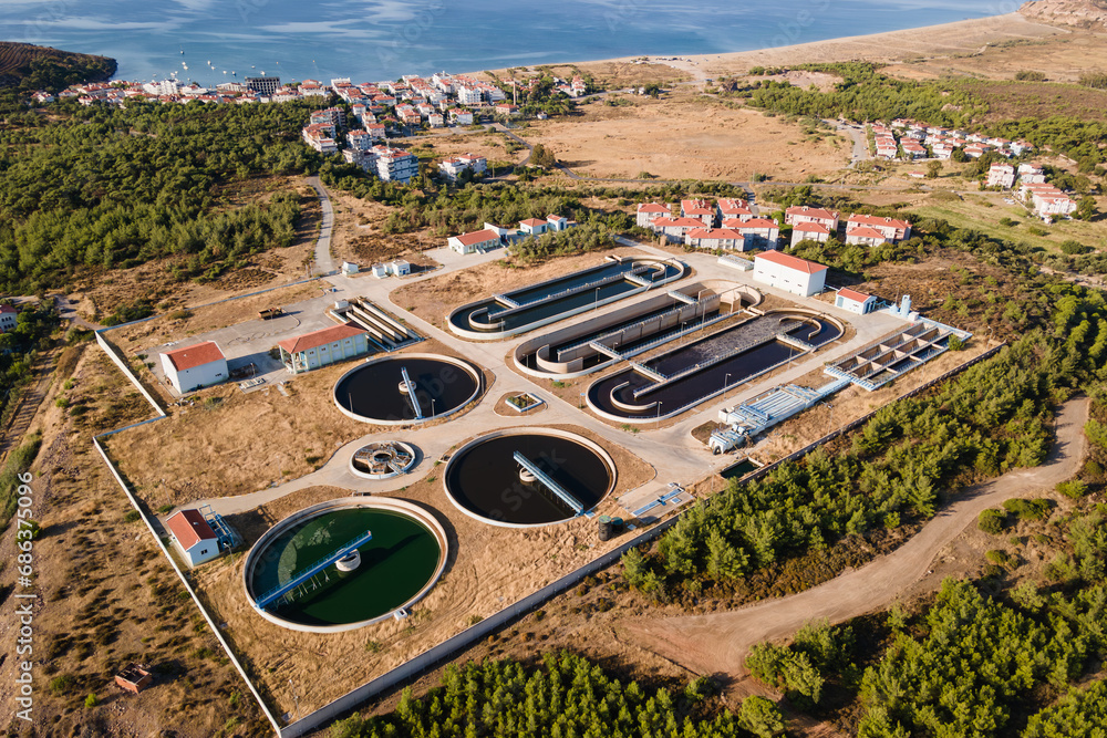 Water basins at sewage treatment plant, sewage treatment plant removes ...