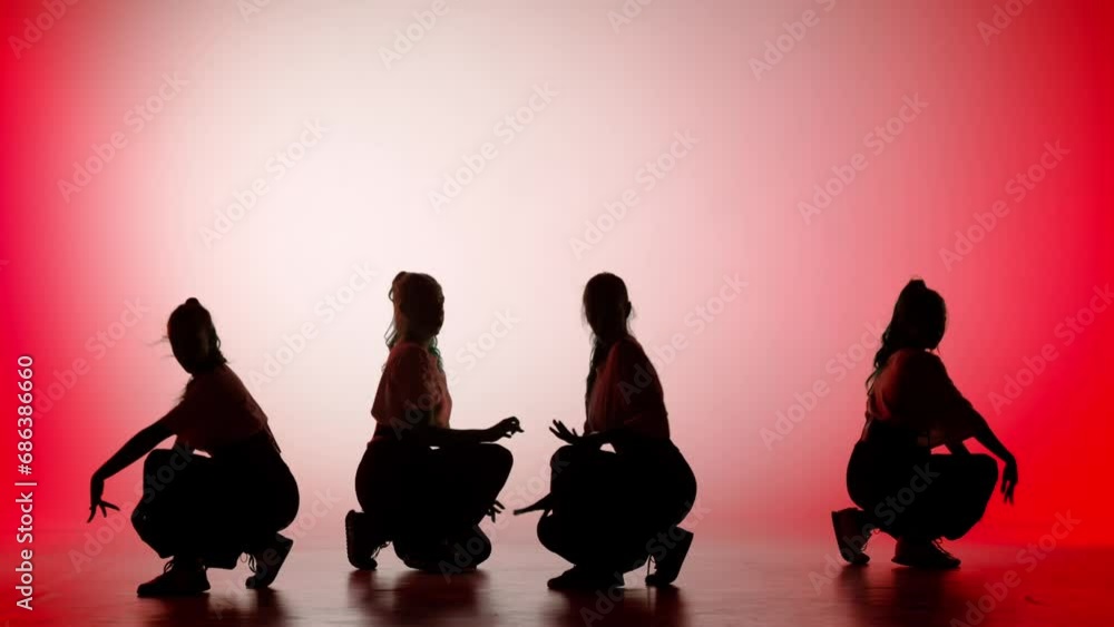 Vidéo Stock In the frame on a red, white background, gradient. Dancing ...