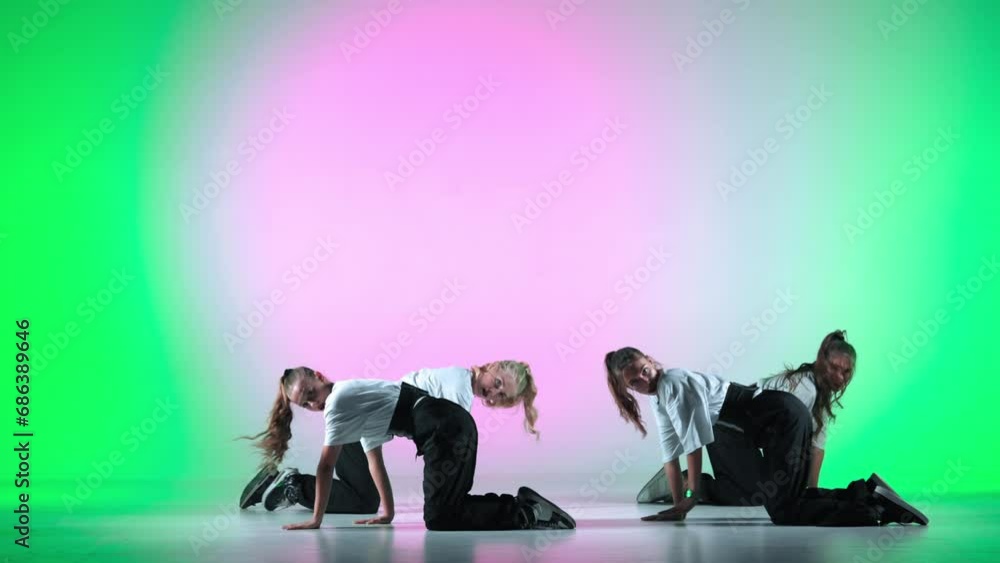 In the frame on a green, gradient background in the spotlight. A group ...