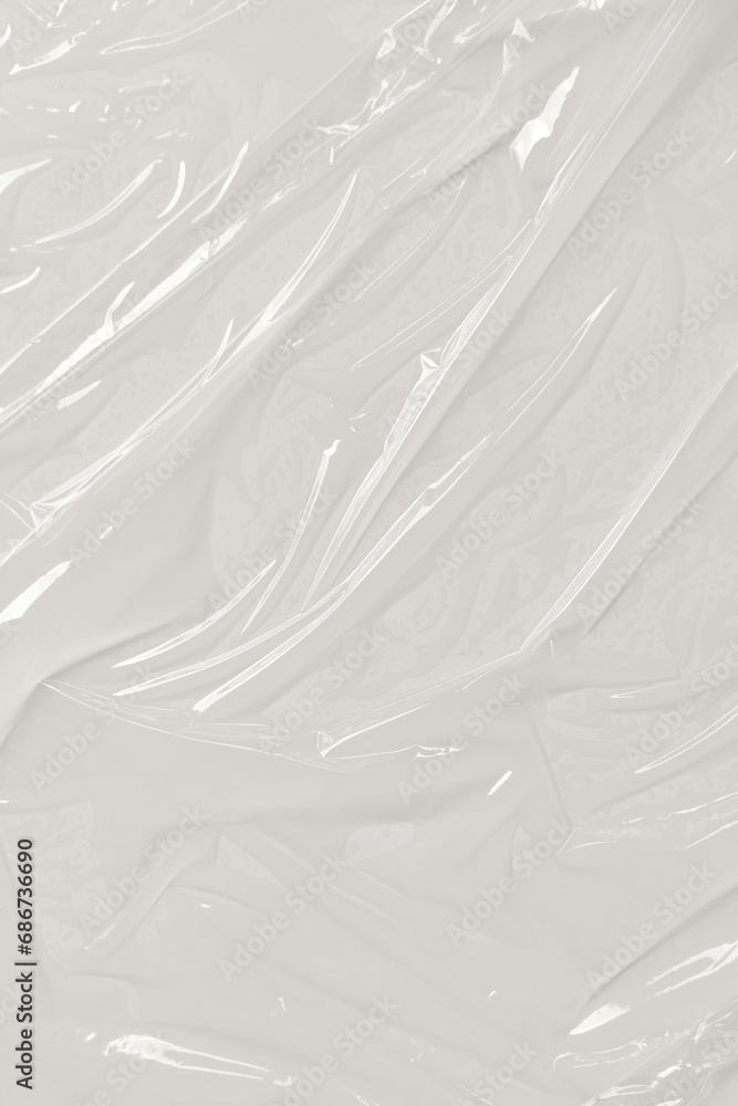 Plastic transparent on white background. White plastic film wrap ...