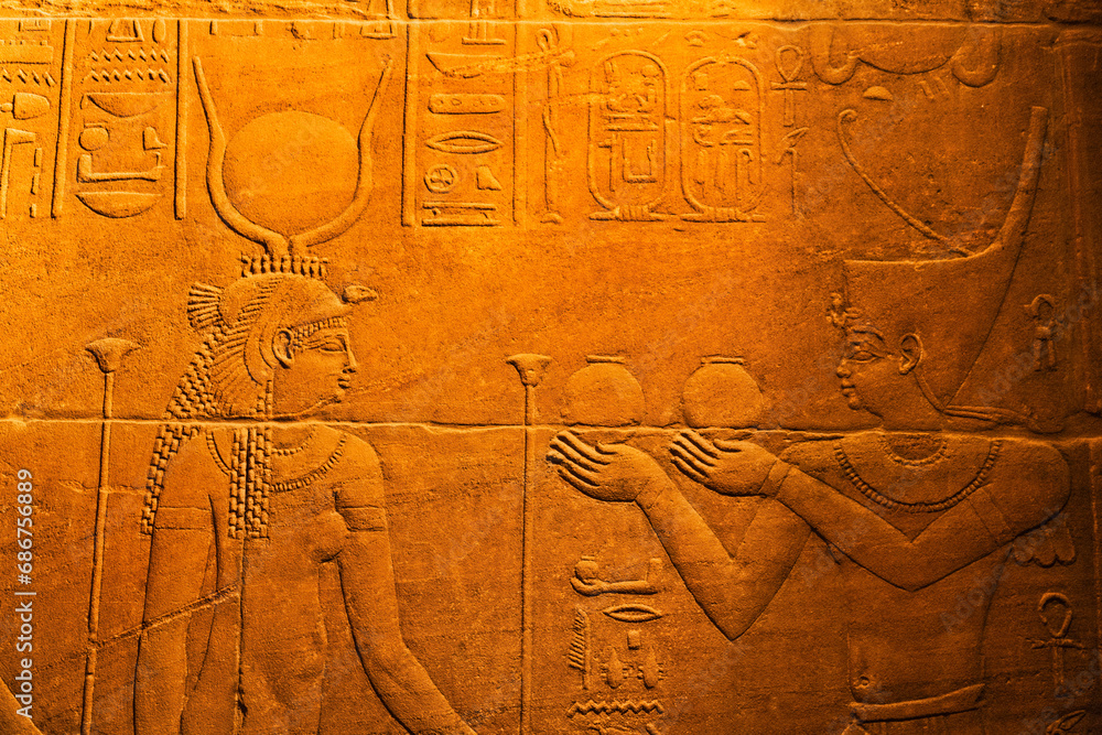 Close-up of bas-relief of hieroglyphs and the Goddess Isis inside the ...