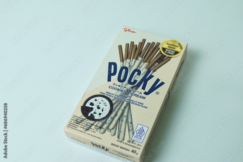 Pocky brand of chocolate sticks on white background. Pocky is a famous ...