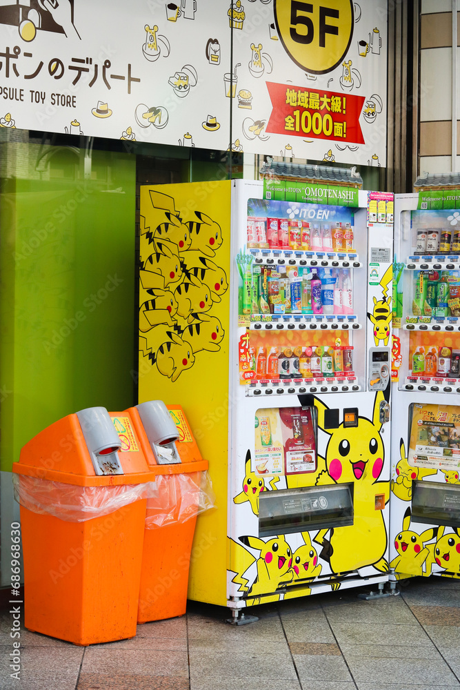 TOKYO, JAPAN - December 1, 2023: Pair of drinks vending machine with ...