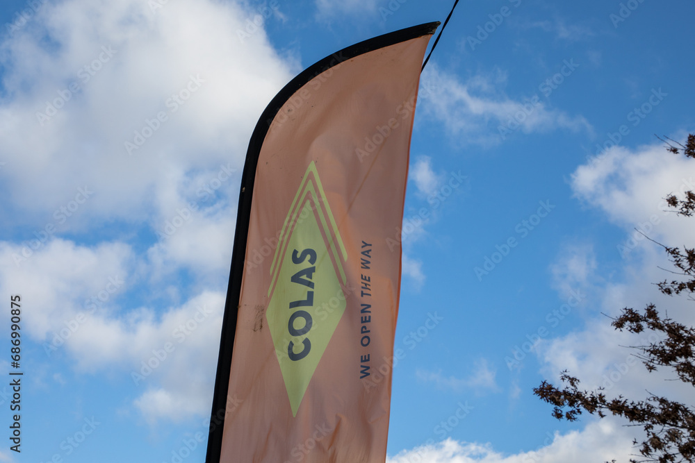 Colas logo brand and text yellow street flag information sign of ...