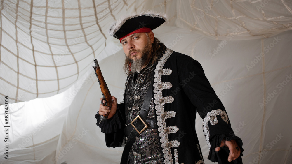 A brave captain with a doublet and a cocked hat, a sailor and a pirate ...