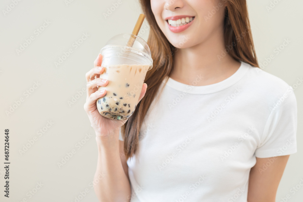 Beverage and food concept, Happy asian young woman hand holding plastic ...
