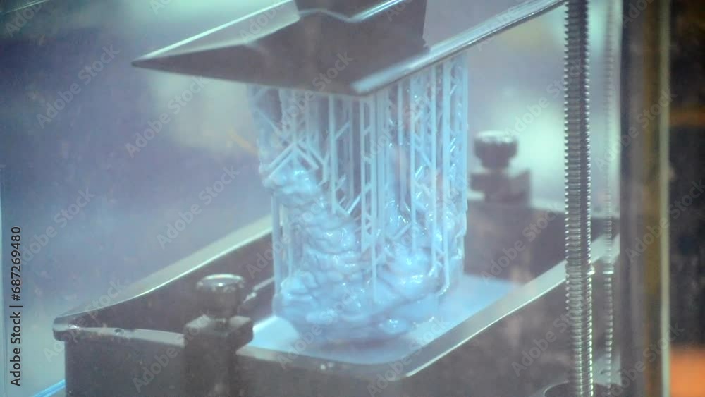 3D printer working process. 3D printing. Stereolithography ...