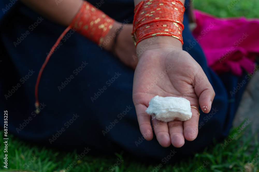 Horizontal shot of the hands of an indigenous woman from Ecuador with ...