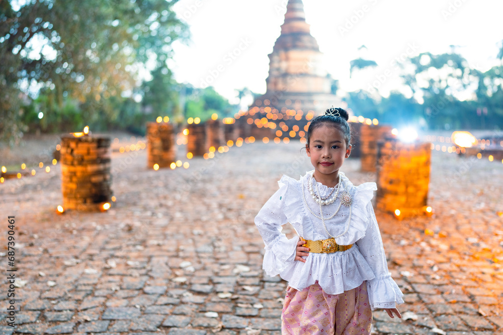Cute girl in traditional dress at ancient temple Chiang Mai Thailand ...