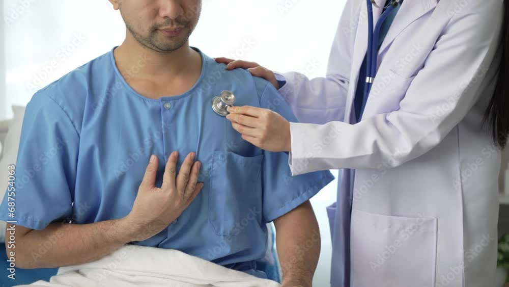 Beautiful female doctor uses stethoscope to listen to heart and lung ...
