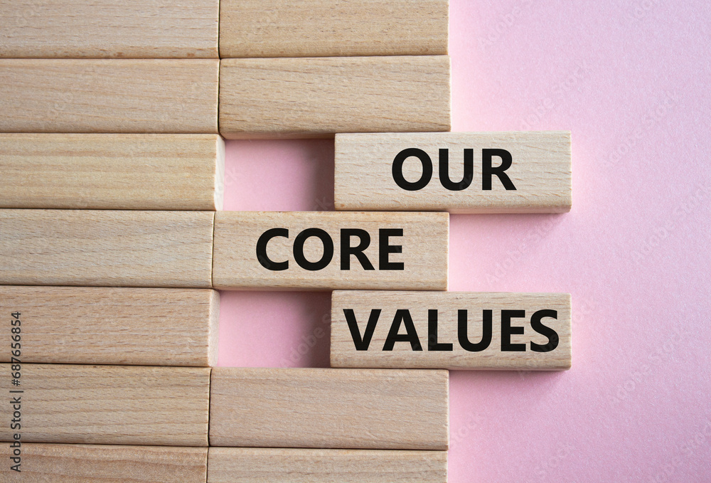 Our core values symbol. Concept words Our core values on wooden blocks ...