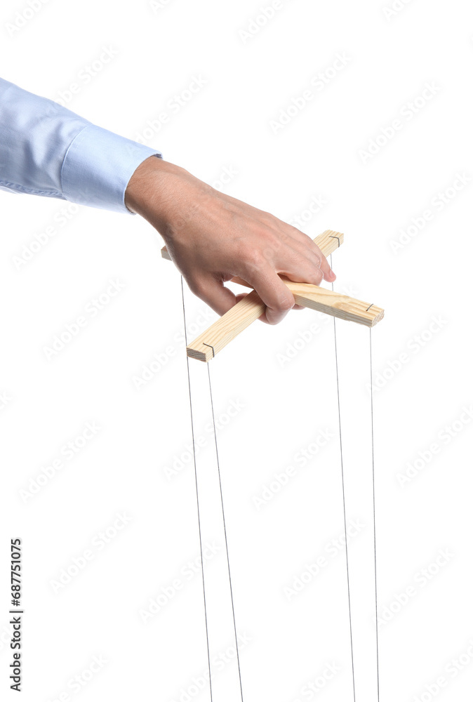 Man holding puppet control bar with strings on white background ...