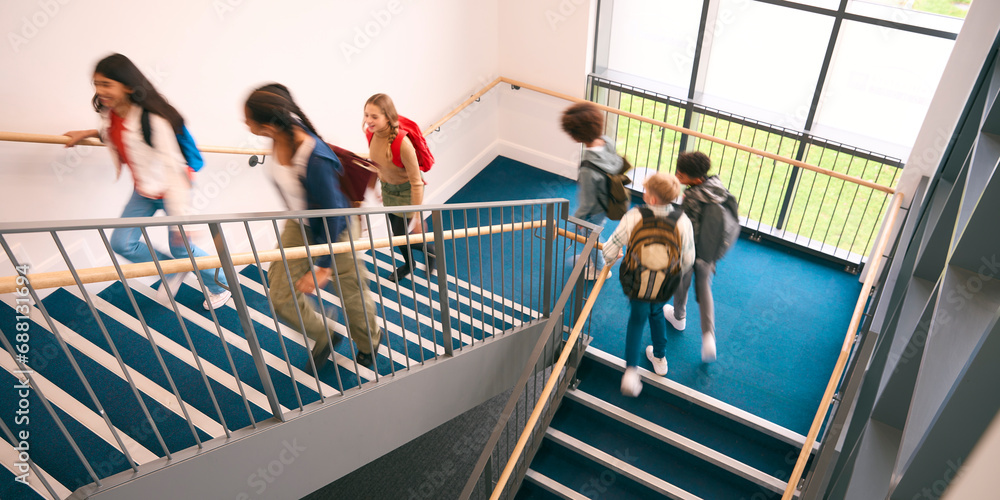 Group Of Secondary Or High School Pupils Inside School Building On ...