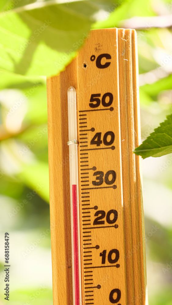 The thermometer shows a temperature of 30 degrees Celsius during the ...