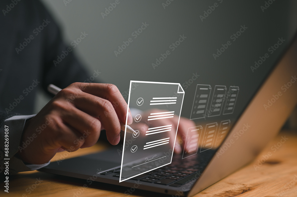 Business performance checklist, businessman using laptop doing online ...