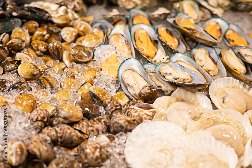 Many types of shellfish are frozen to be sold in the market for cooking ...