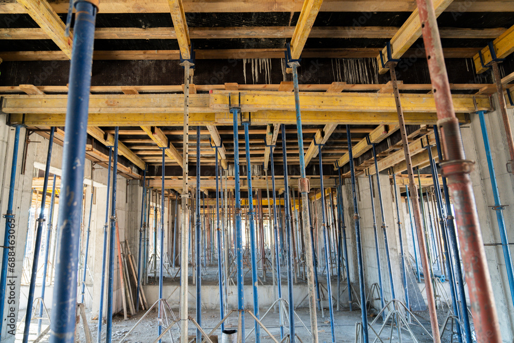 Formwork supports the second floor of a monolithic building ...