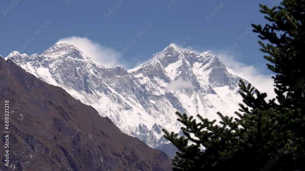 Snow peak Mount Everest rises above barren landscape of Himalayan ...