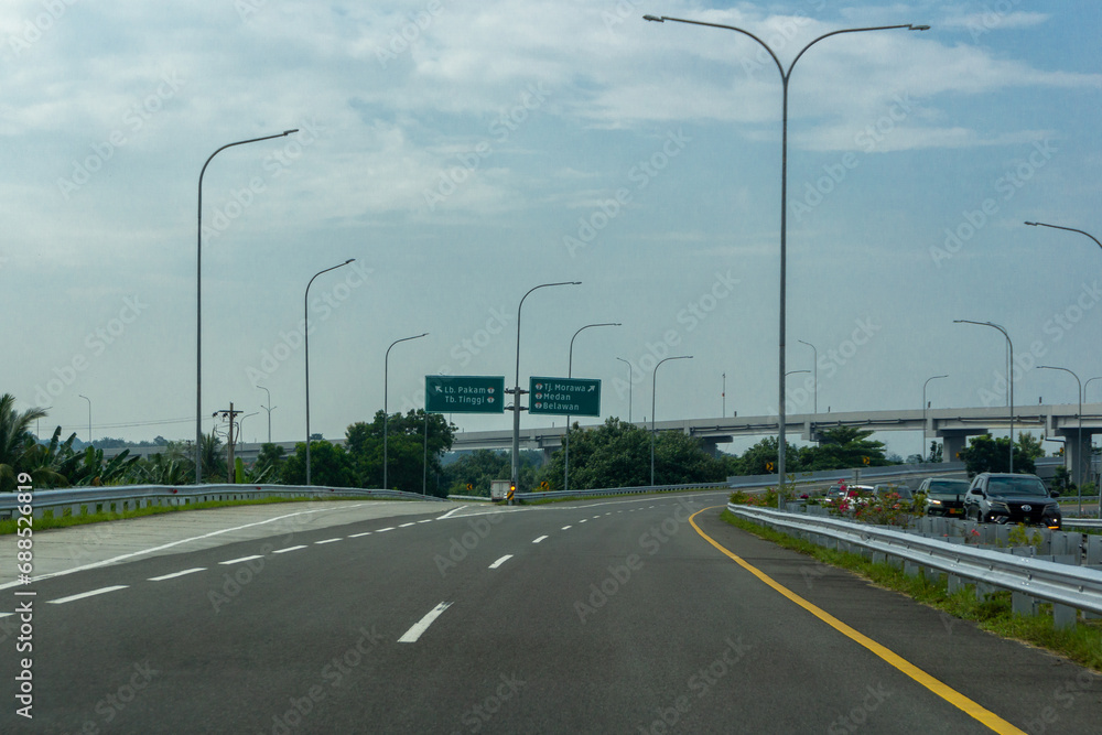 view of Jalan Tol Trans Sumatera. Way sign to different place in north ...