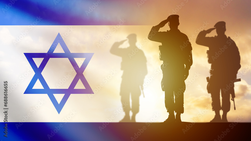 Soldiers with Israeli flag. Fighters salute standing at sunset. Israel ...