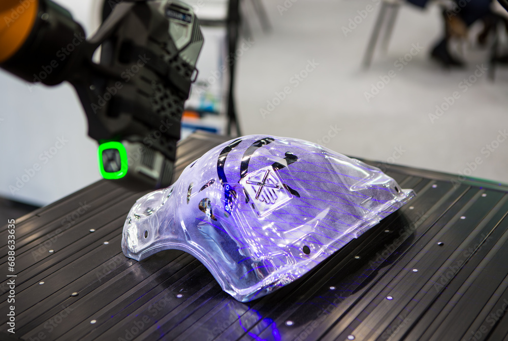 Automated 3D measurement. Robot perform 3D scan on workpiece ...