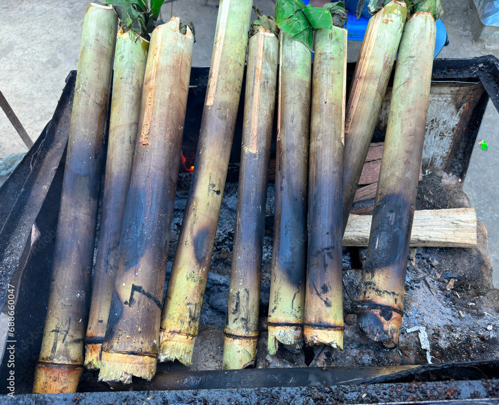Traditional Bamboo Chicken Cooked inside Bamboos - Traditional Tribal ...
