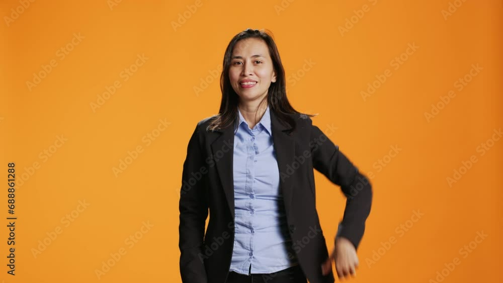 Filipino employee does thumbs up gesture on camera, expressing ...